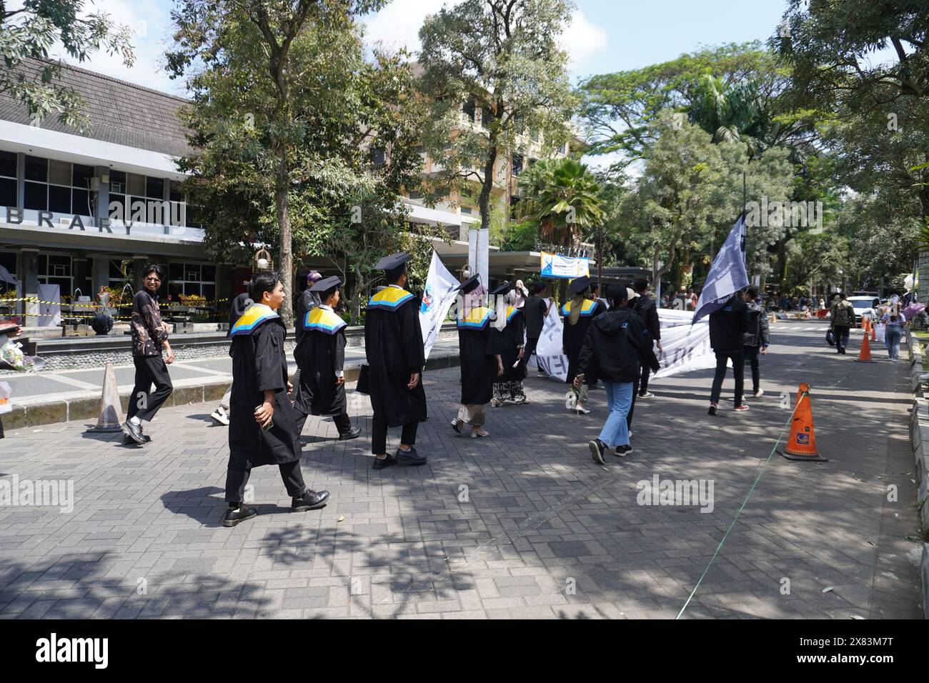 Graduation celebration at a university in Indonesia by walking around ...