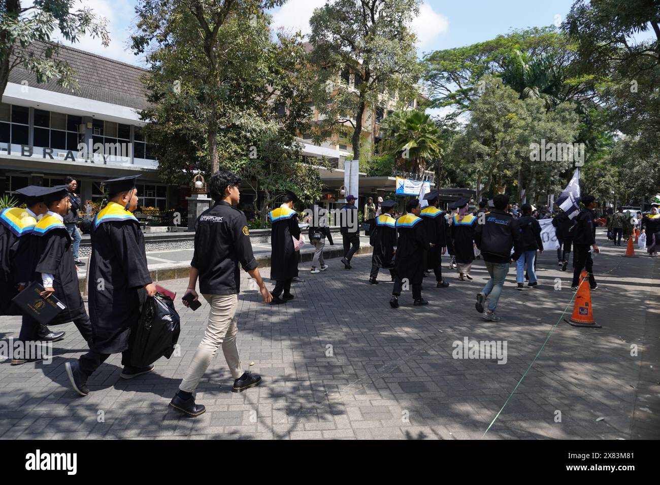 Graduation celebration at a university in Indonesia by walking around ...