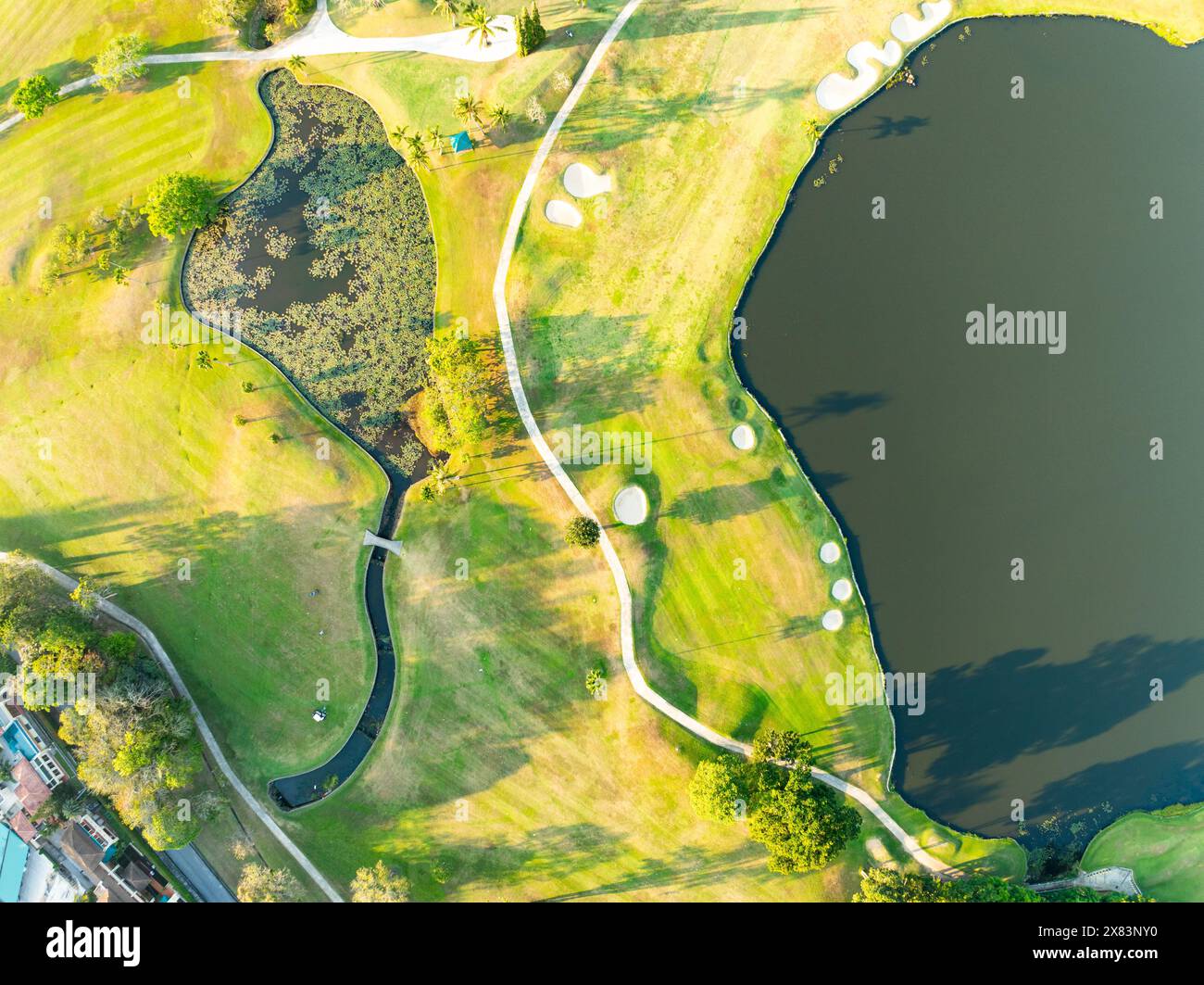 Aerial view drone shot of beautiful green golf field at Phuket island ...