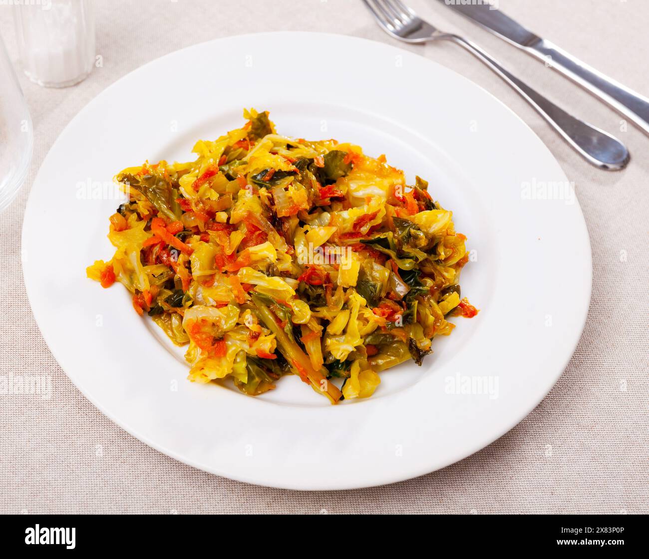Tasty braised white cabbage with carrot and onion Stock Photo - Alamy