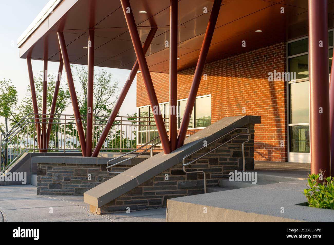 Example of a stainless steel railing along an exterior set of stairs at ...