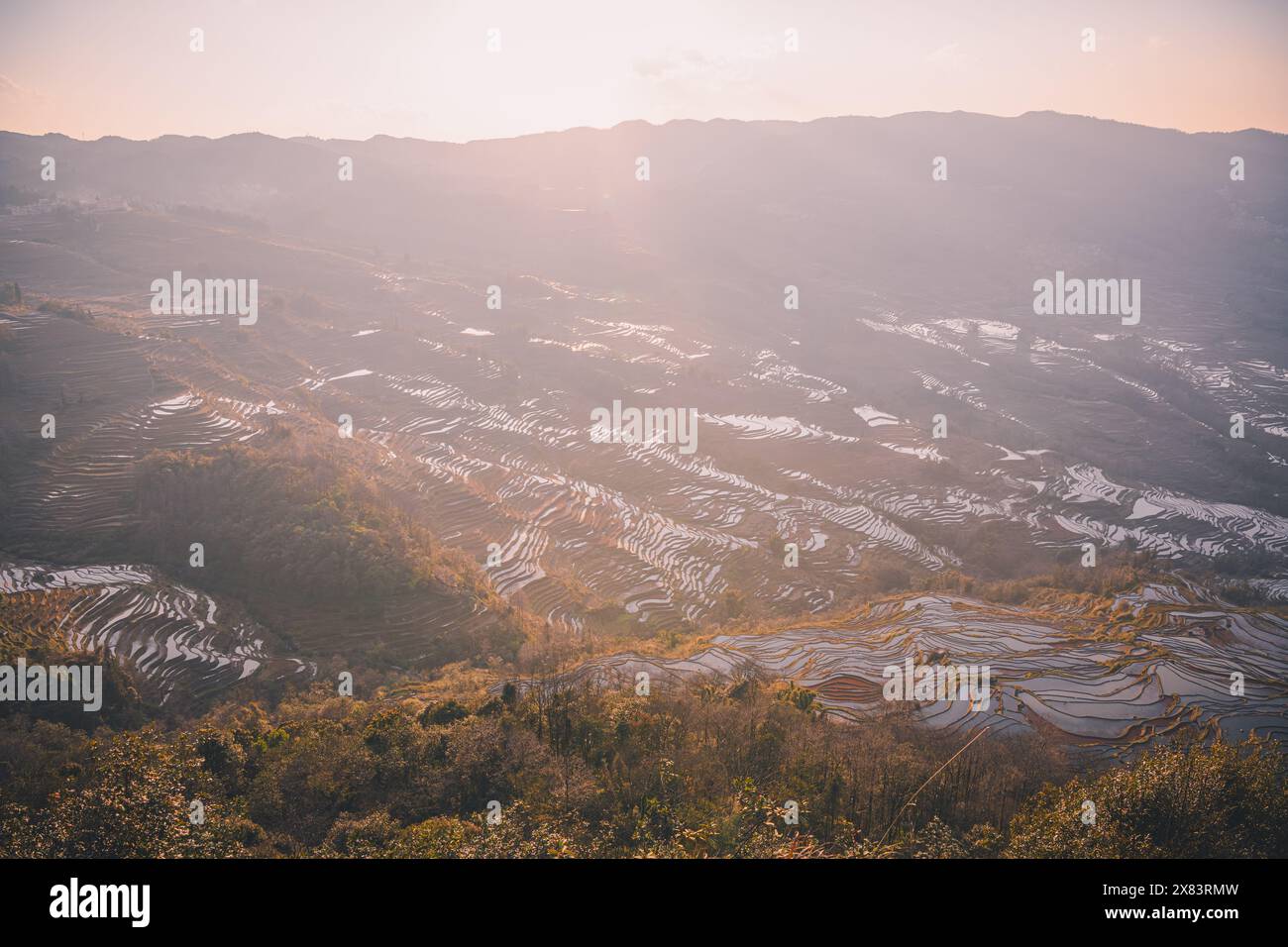 Sunset over YuanYang rice terraces in Yunnan, China, one of the latest ...