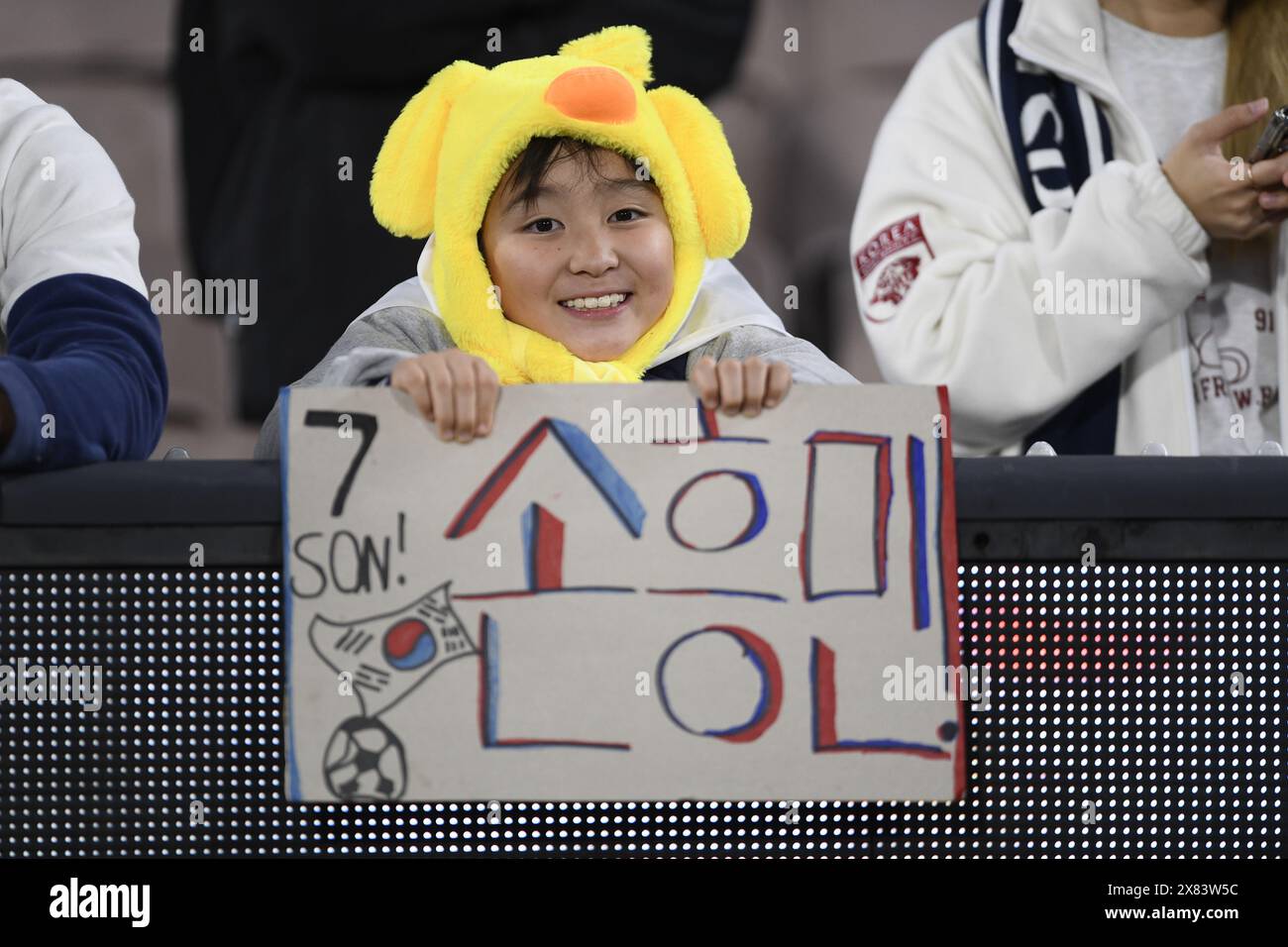 Korean football fan with son heung min banner hi-res stock photography ...