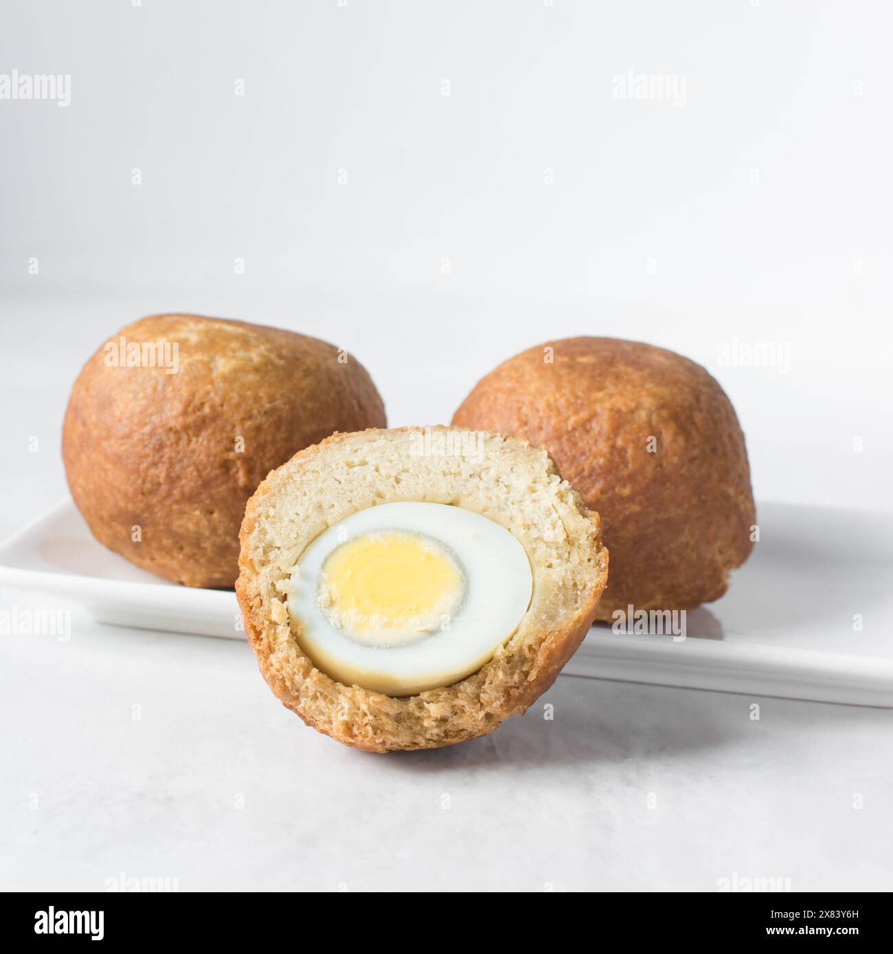 homemade nigerian egg roll on a white background, freshly made african ...