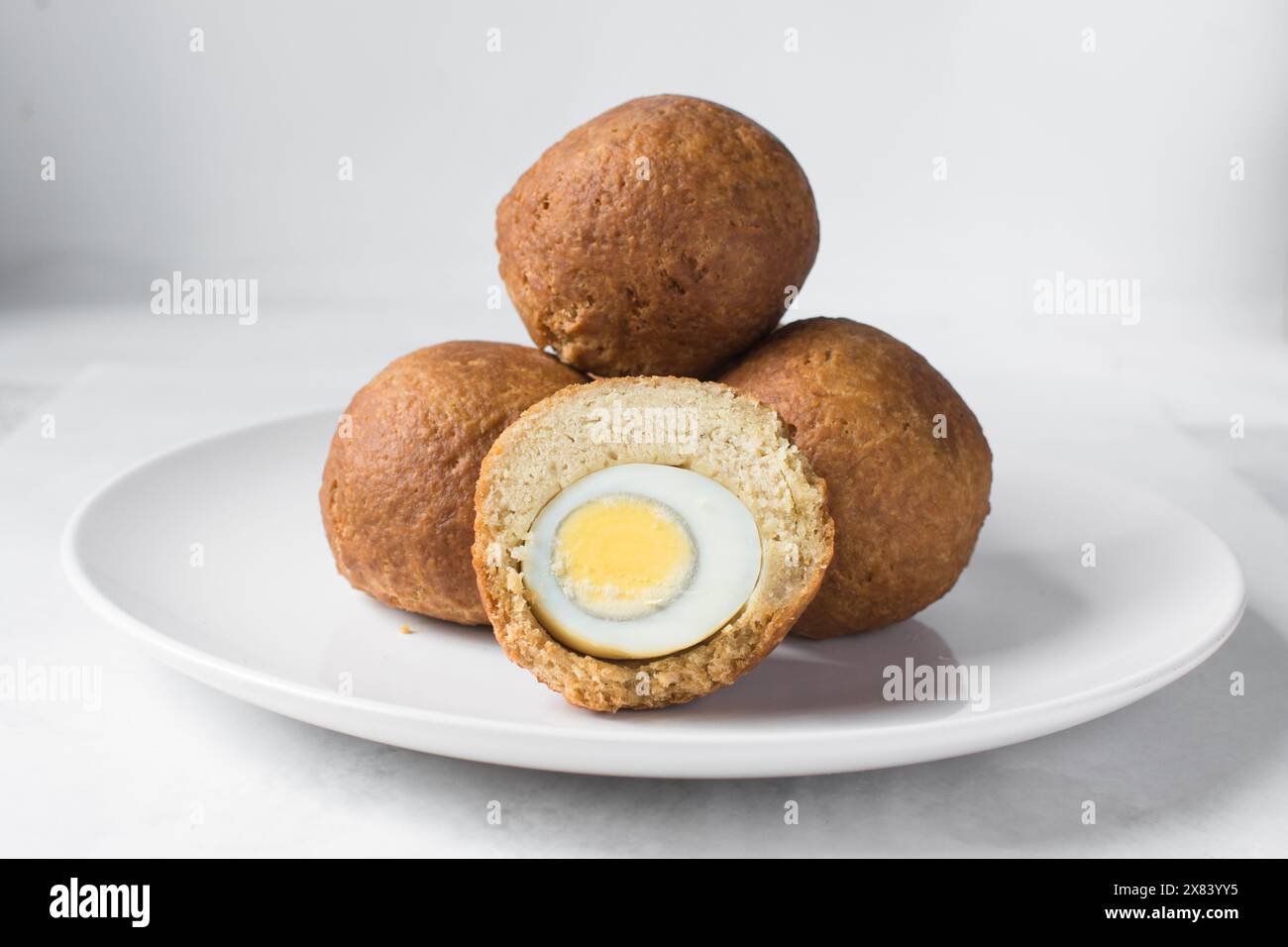 homemade nigerian egg roll on a white background, freshly made african ...