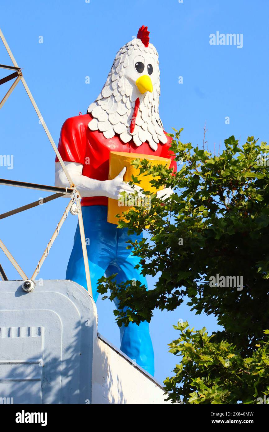 Chicken boy statue hi-res stock photography and images - Alamy