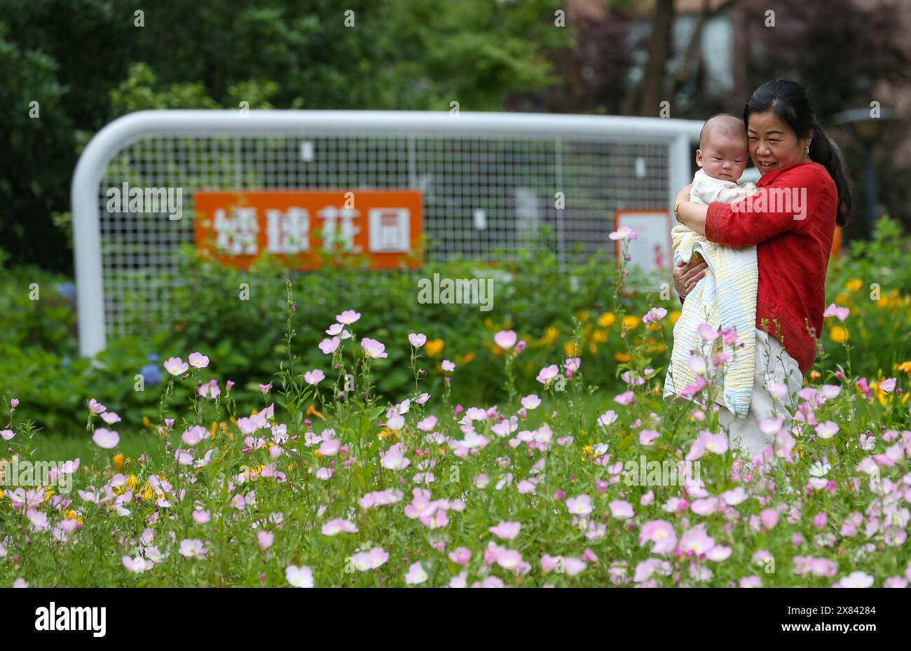 Wuxi, China's Jiangsu Province. 22nd May, 2024. People enjoy themselves ...