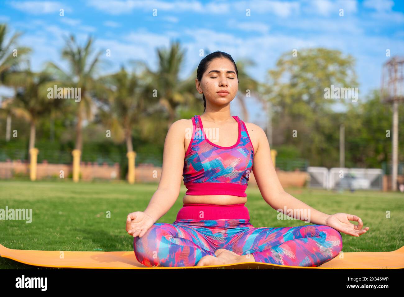 young indian fitness girl doing Lotus Pose , Padmasana yoga pose in ...
