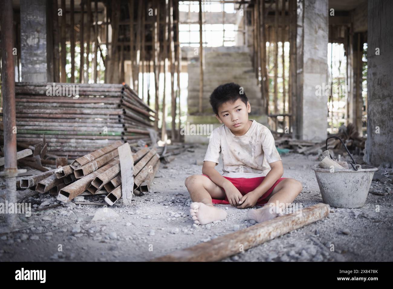 Poor children are forced to work in construction. Child labor in ...
