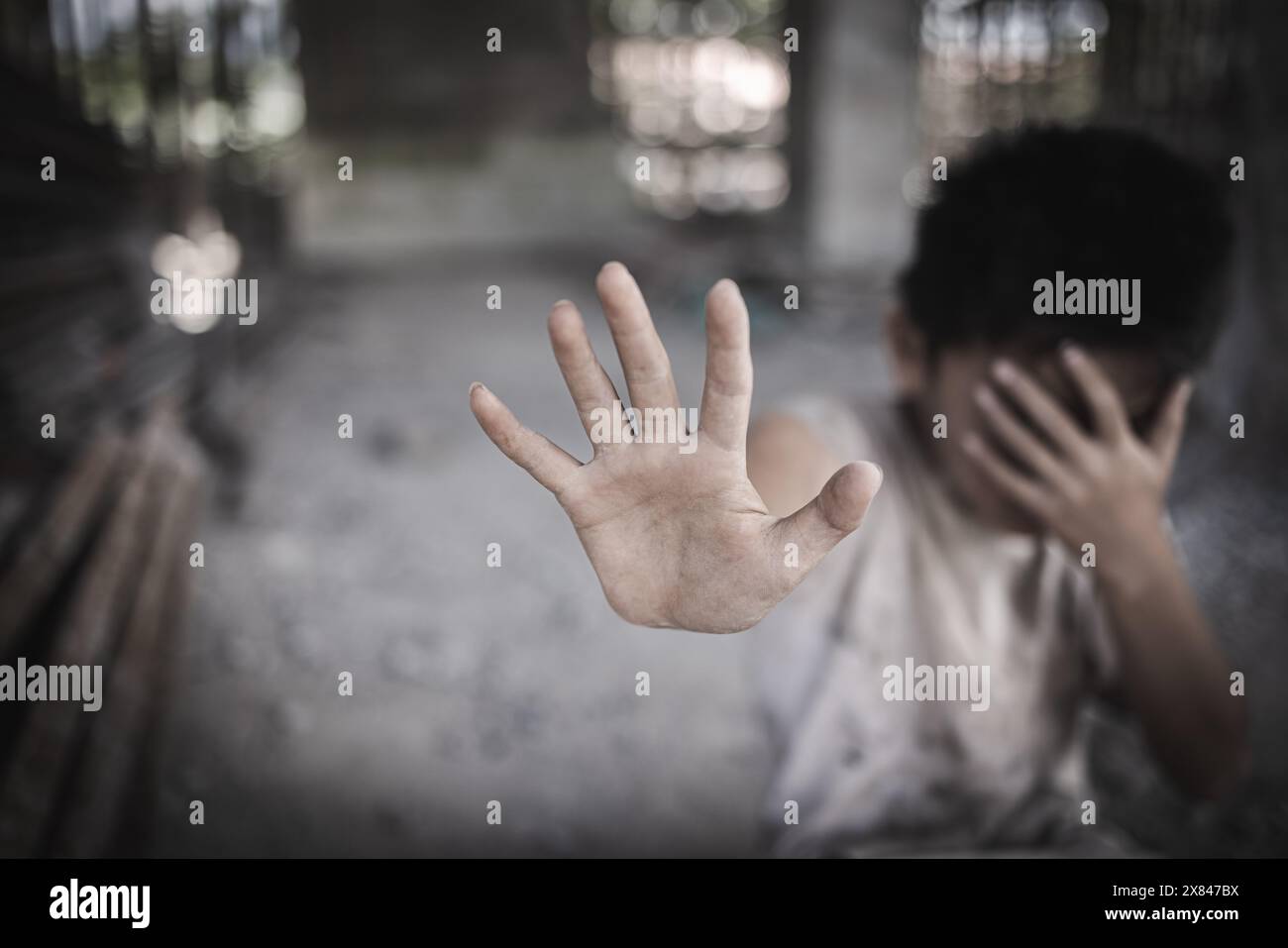 Boy showing hand signaling to stop useful to campaign against violence ...