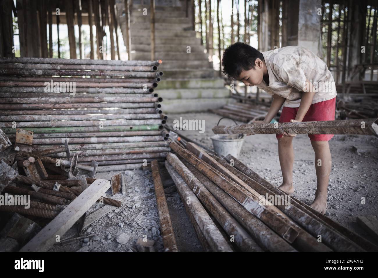 Poor children are forced to work in construction. Child labor in ...