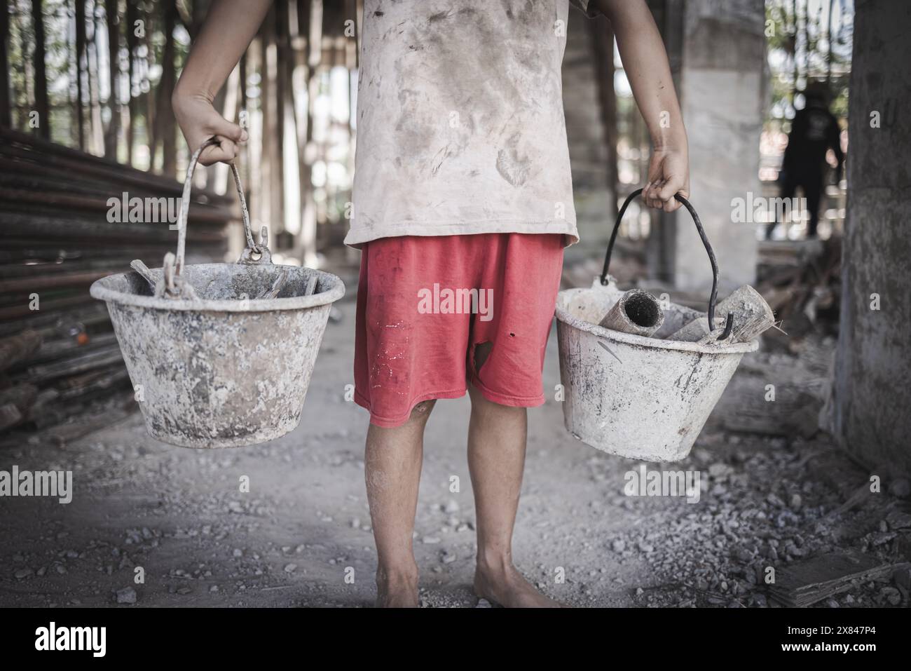 Poor children are forced to work in construction. Child labor in ...