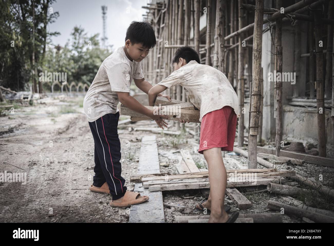 Poor children are forced to work in construction. are forced to work in ...