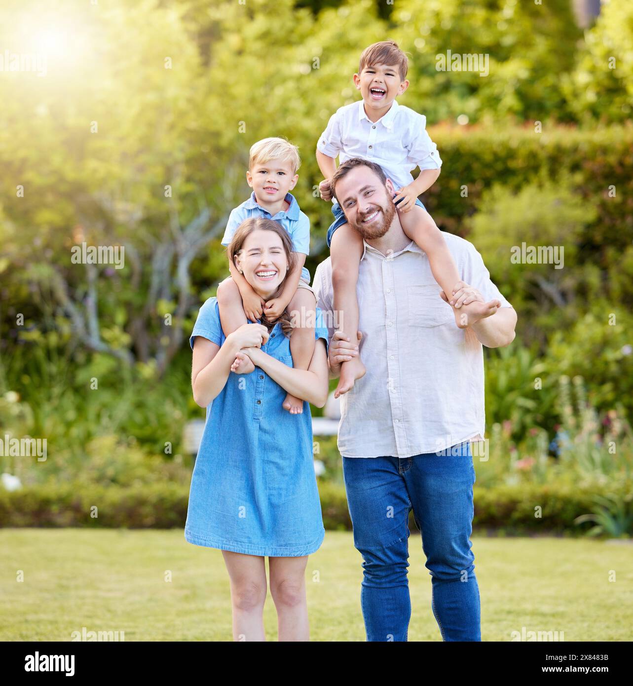 Smile, portrait and children on parents shoulders in nature with hug ...