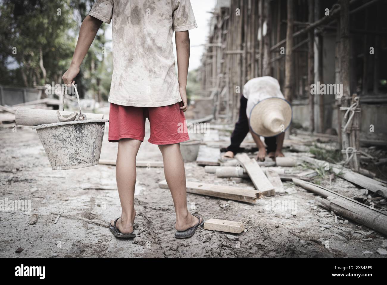 Poor children are forced to work in construction. are forced to work in ...