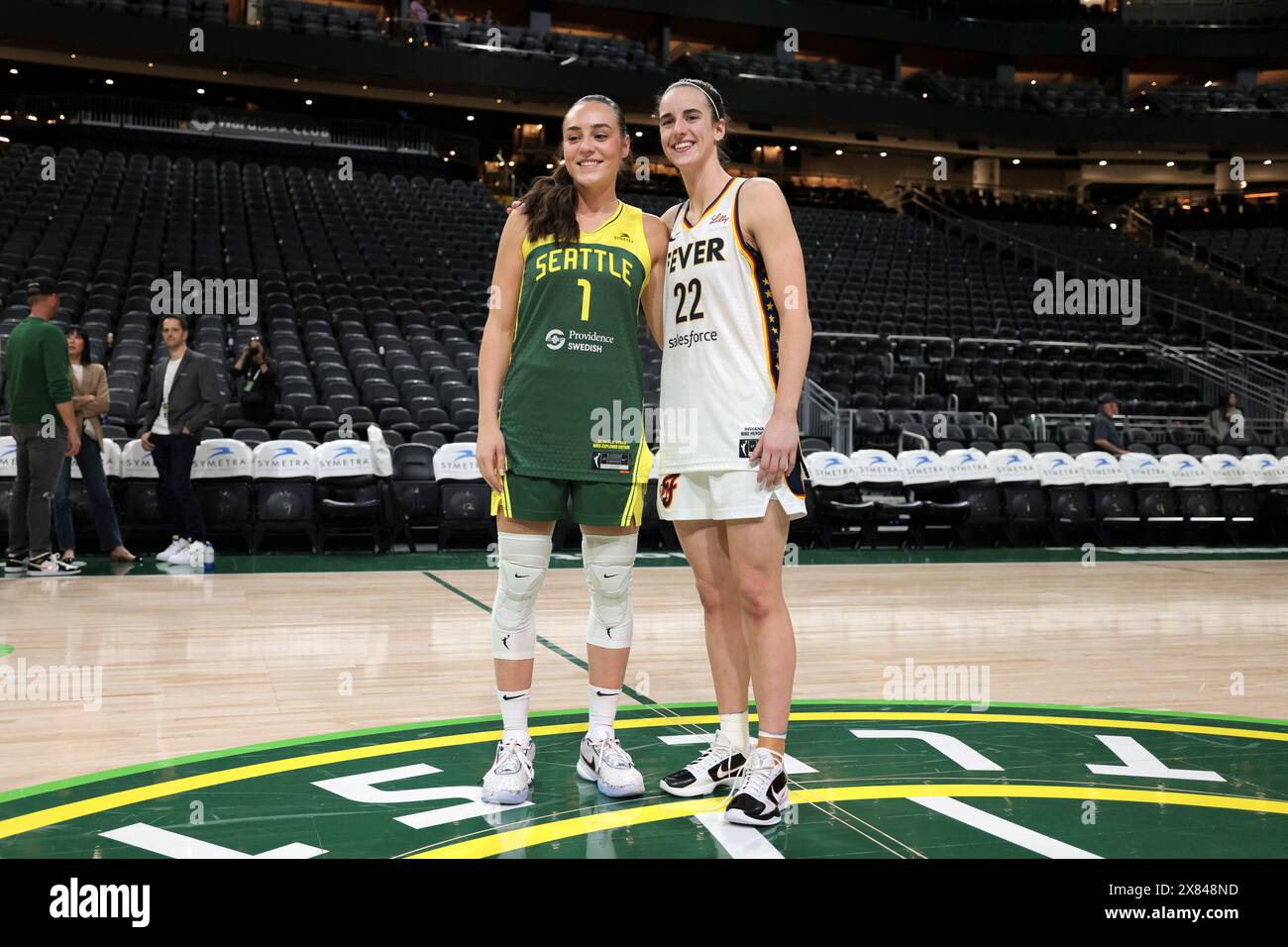 Seattle Storm guard Nika Muhl, left, and Indiana Fever guard Caitlin ...