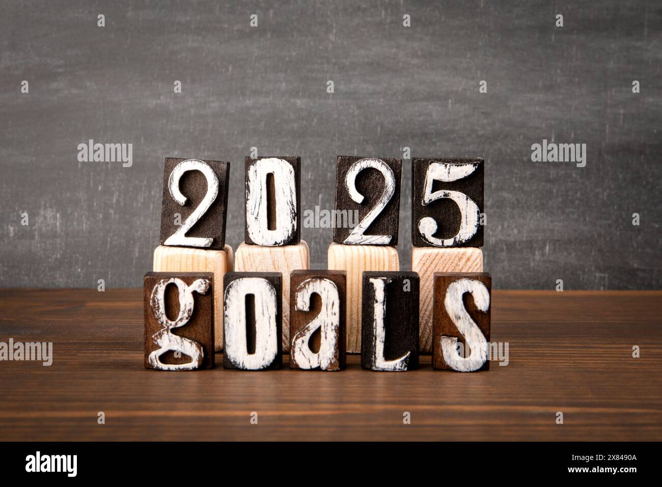 2025 Goals Concept. Alphabet blocks on wood texture background Stock ...