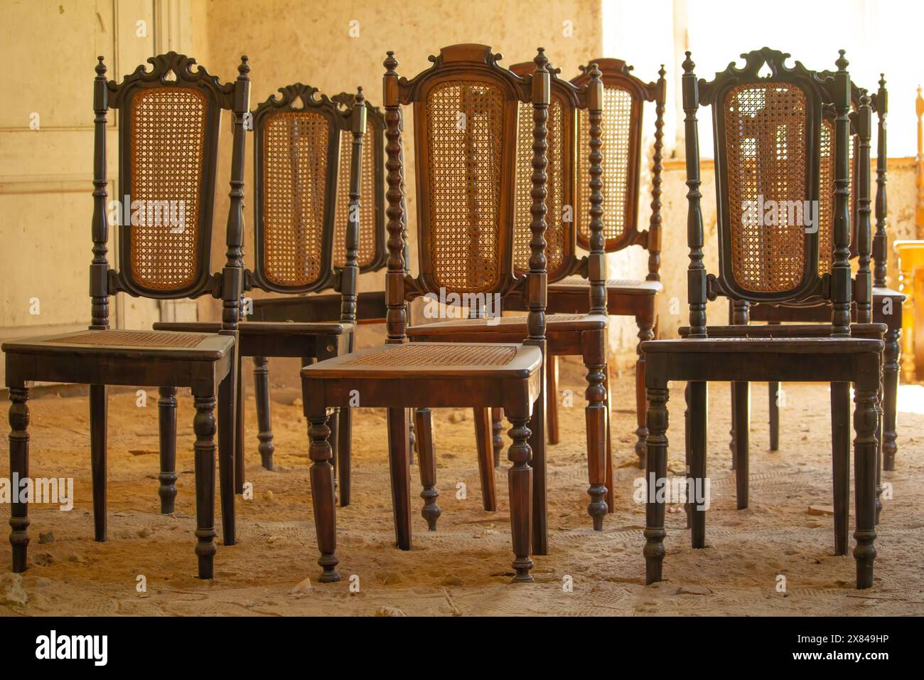 Old vintage wooden chairs in old house. Wooden folding chairs for rest ...