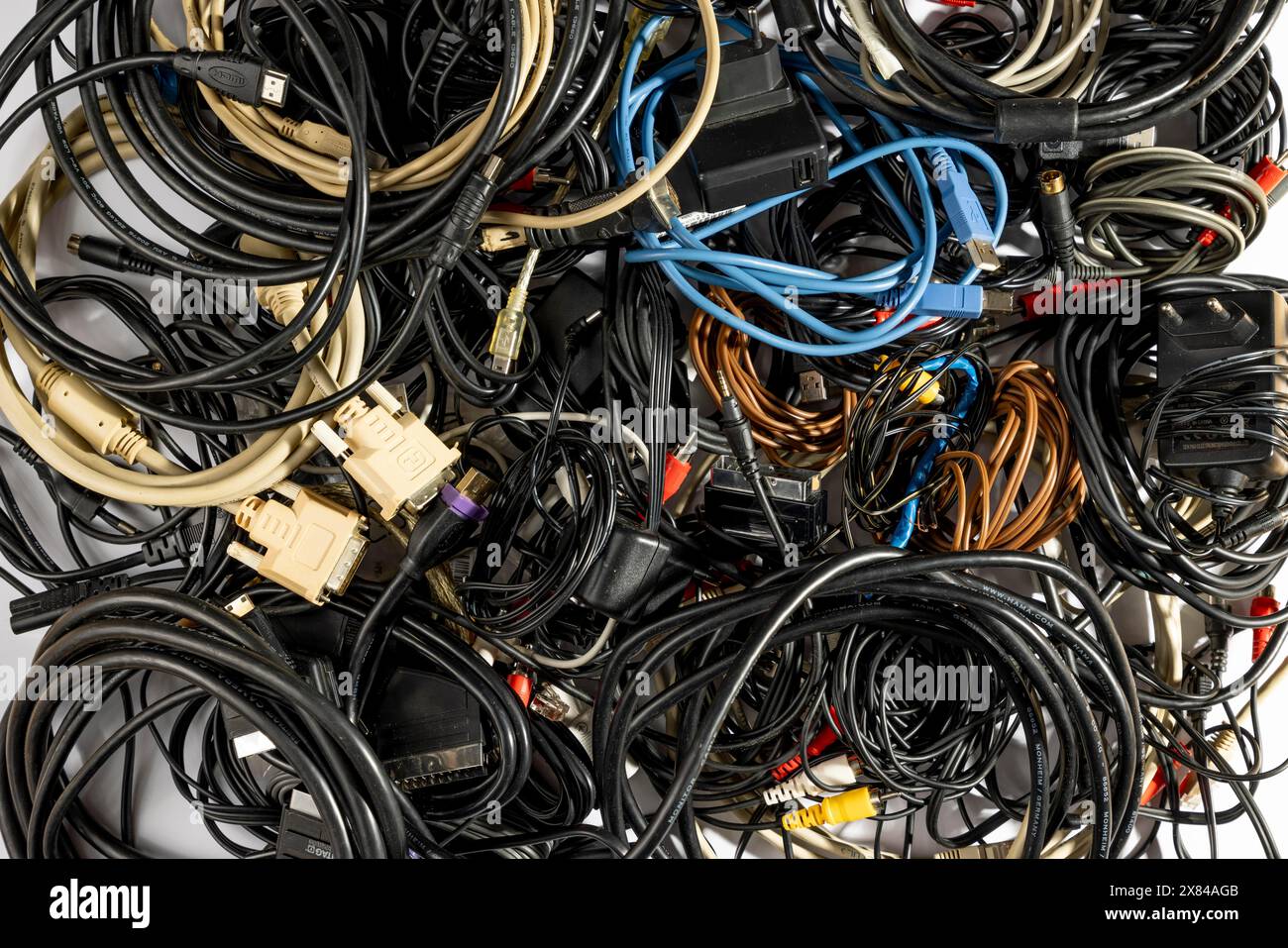 Different cables in different colours in a pile, cable clutter Stock ...