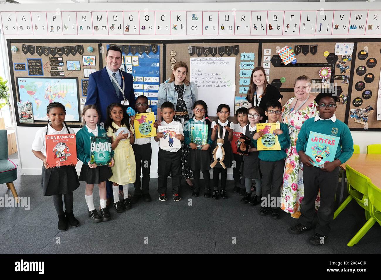 EDITORIAL USE ONLY (Left to right) Head teacher Jonathan Owen, Princess ...