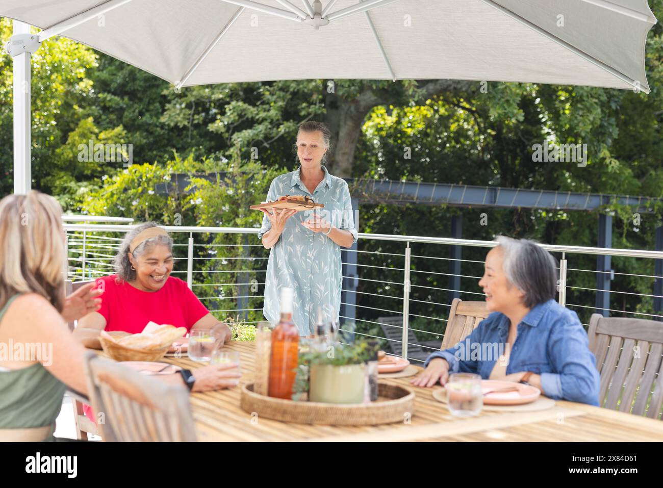 Diverse senior friends sharing hi-res stock photography and images - Alamy