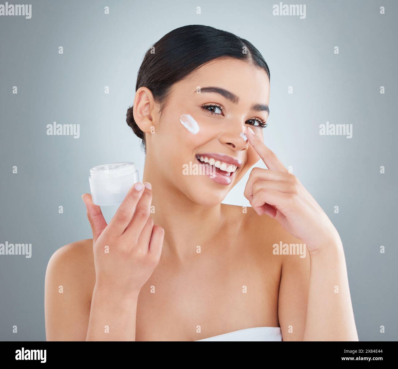 Portrait, cream and woman with container, cosmetics and dermatology on ...