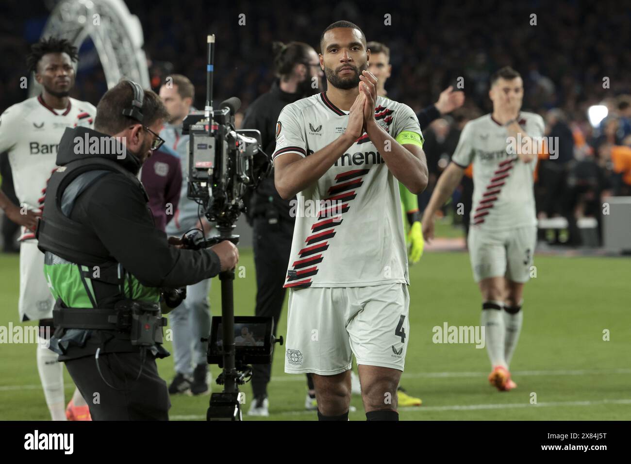 Jonathan Tah of Bayer Leverkusen salutes the supporters following the ...