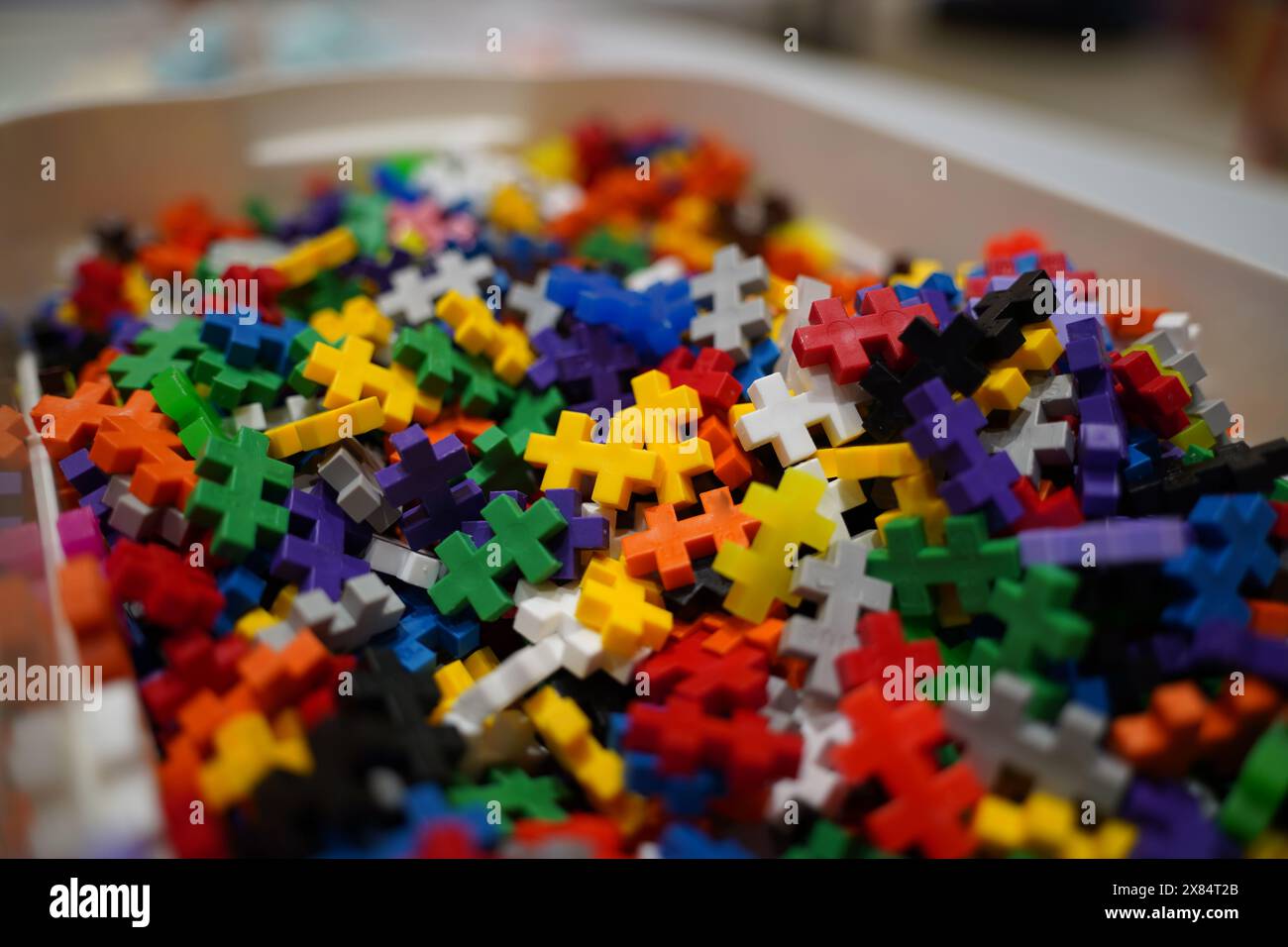 container full of colorful legos Stock Photo - Alamy