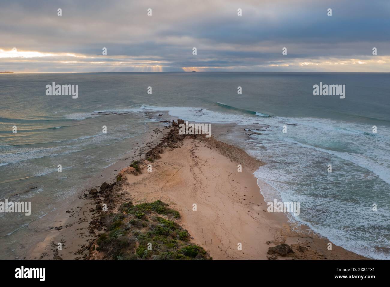 Breaking waves overcast sky hi-res stock photography and images - Alamy
