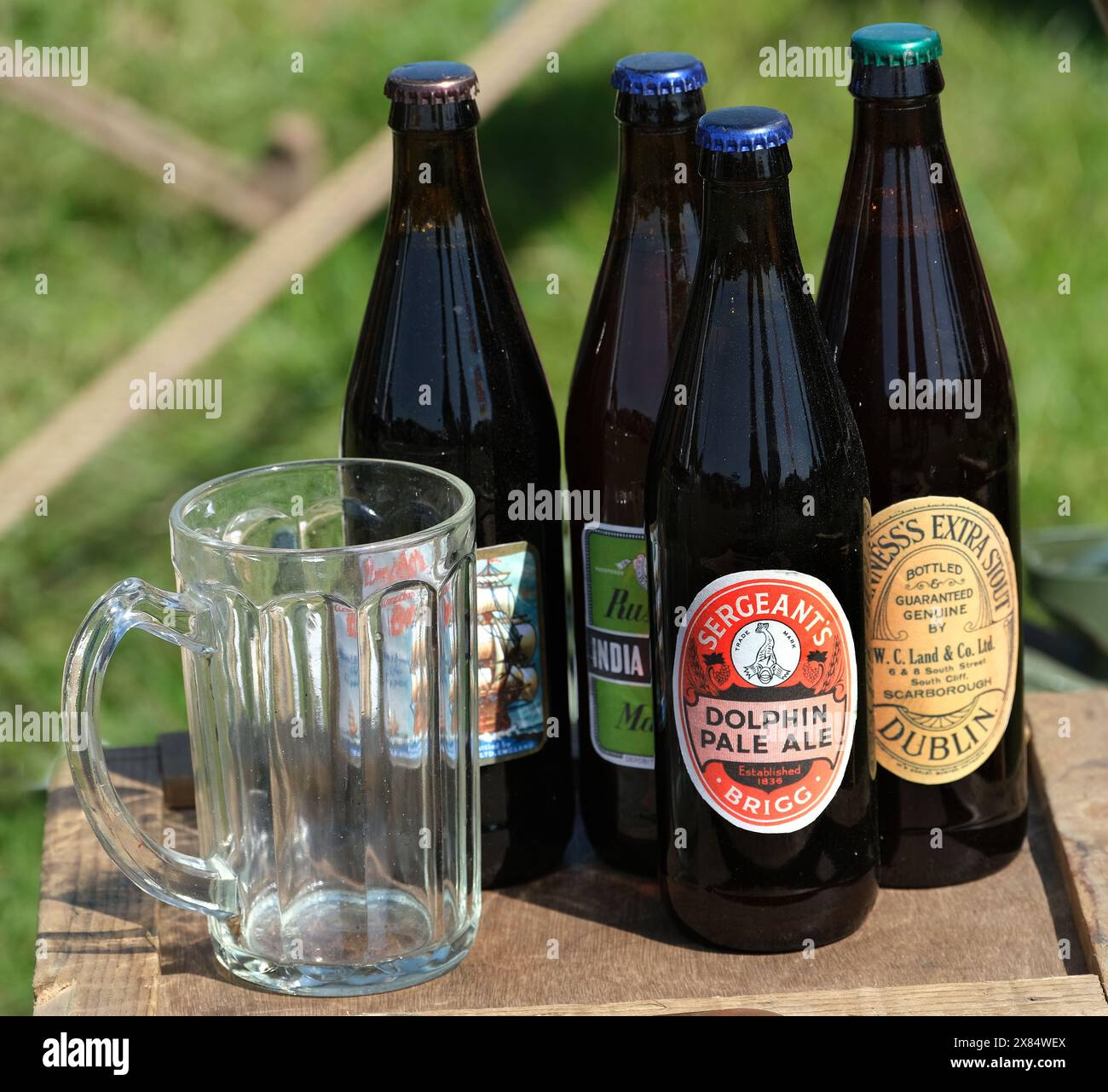 Vinage bber bottles and a glass on display at living history event ...