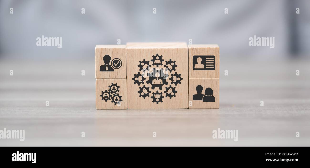 Wooden blocks with symbol of hrm concept Stock Photo - Alamy