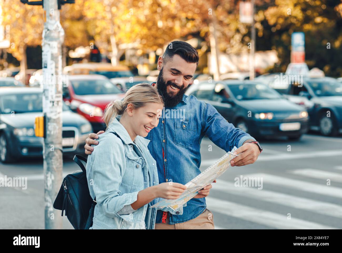 Smiling couple enjoying on vacation, young tourist having fun walking ...