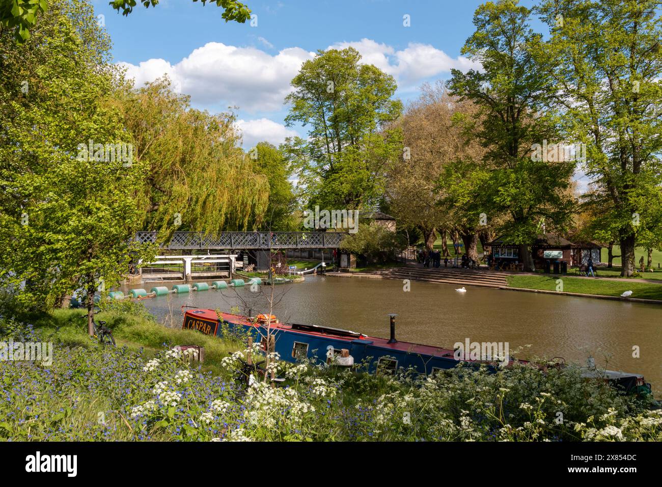 The footbridge over the lock and weir on the river Cam next to Jesus Green, Cambridge, England ...