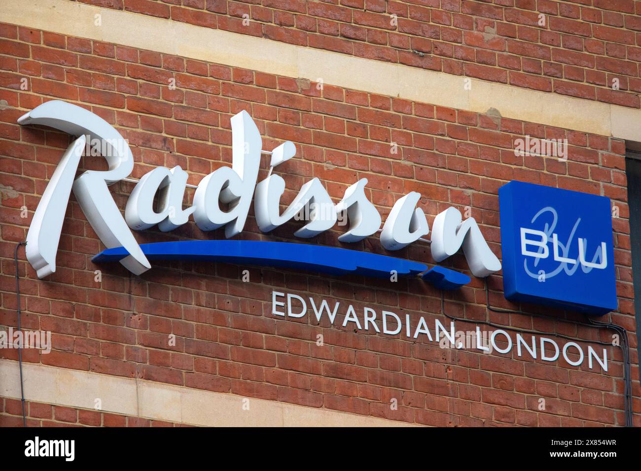 London, UK - February 26th 2024: The Radisson Blu hotel logo, on the ...