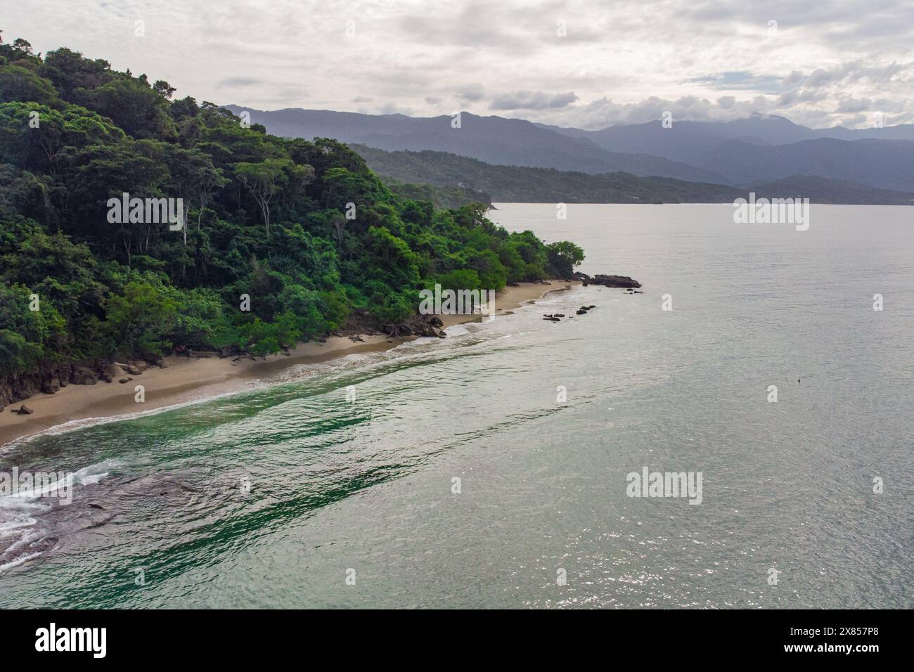 Aerial view of an idyllic caribbean beach with pristine water and white ...