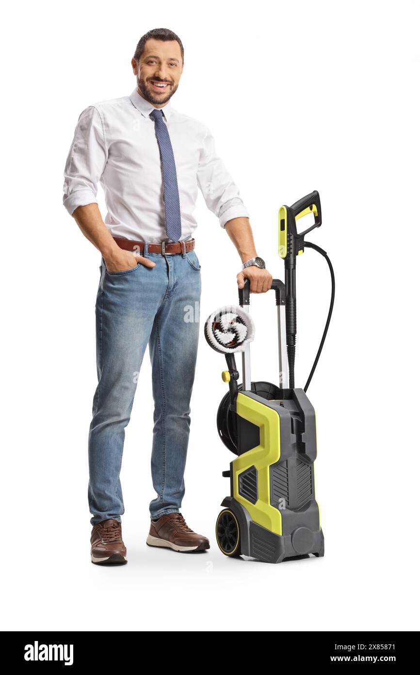 Young man with a high pressure washer machine isolated on white ...