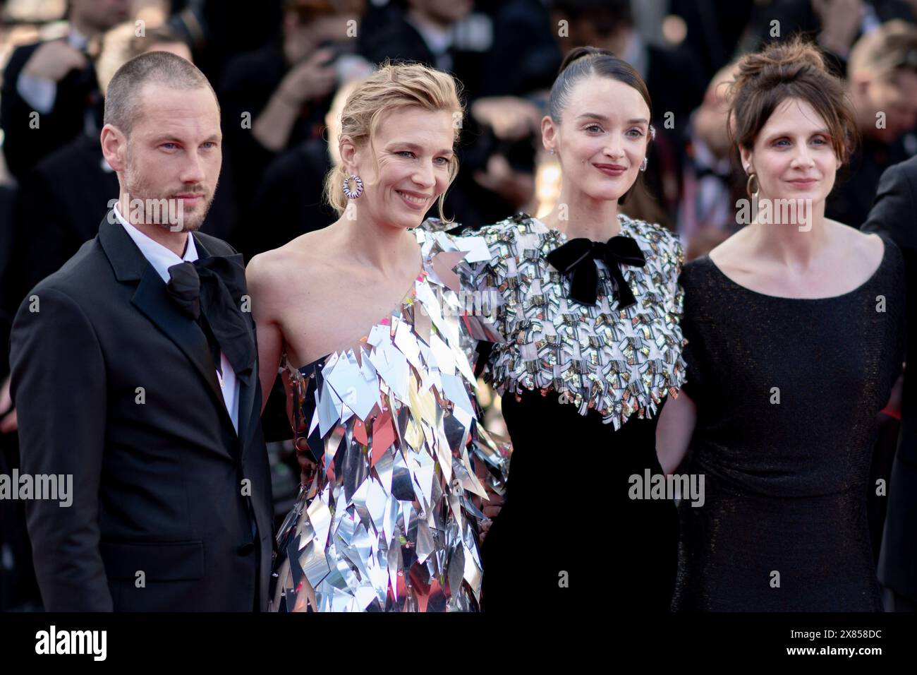 Cannes, France. 22th May, 2024. John Robinson, Celine Sallette ...