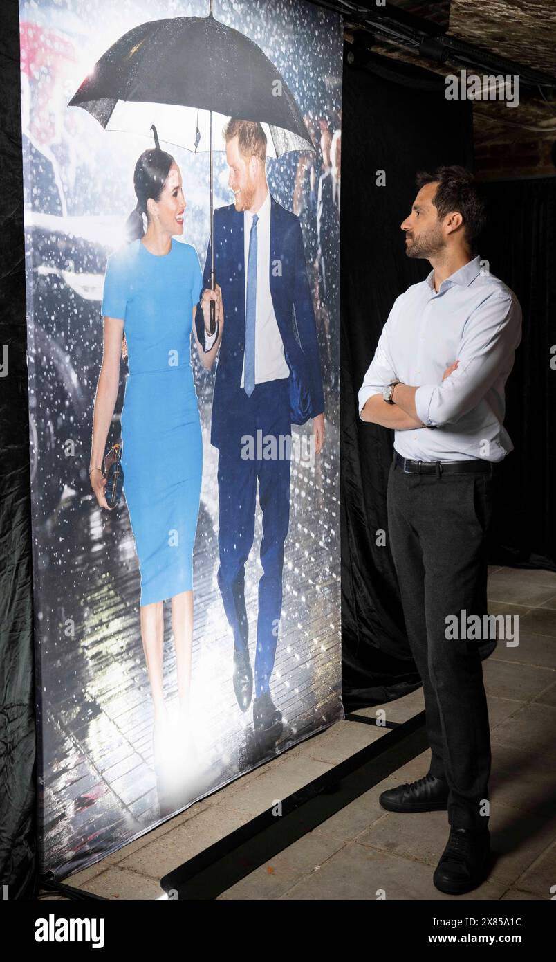 EDITORIAL USE ONLY Photographer Samir Hussein with his photo of the ...
