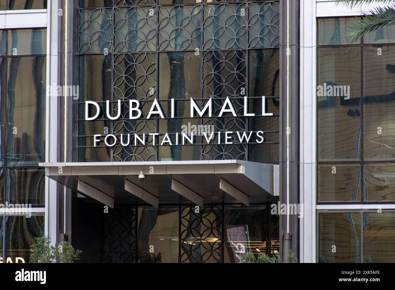 Dubai Mall Signboard name on the wall. Fountain views. Famous shopping ...
