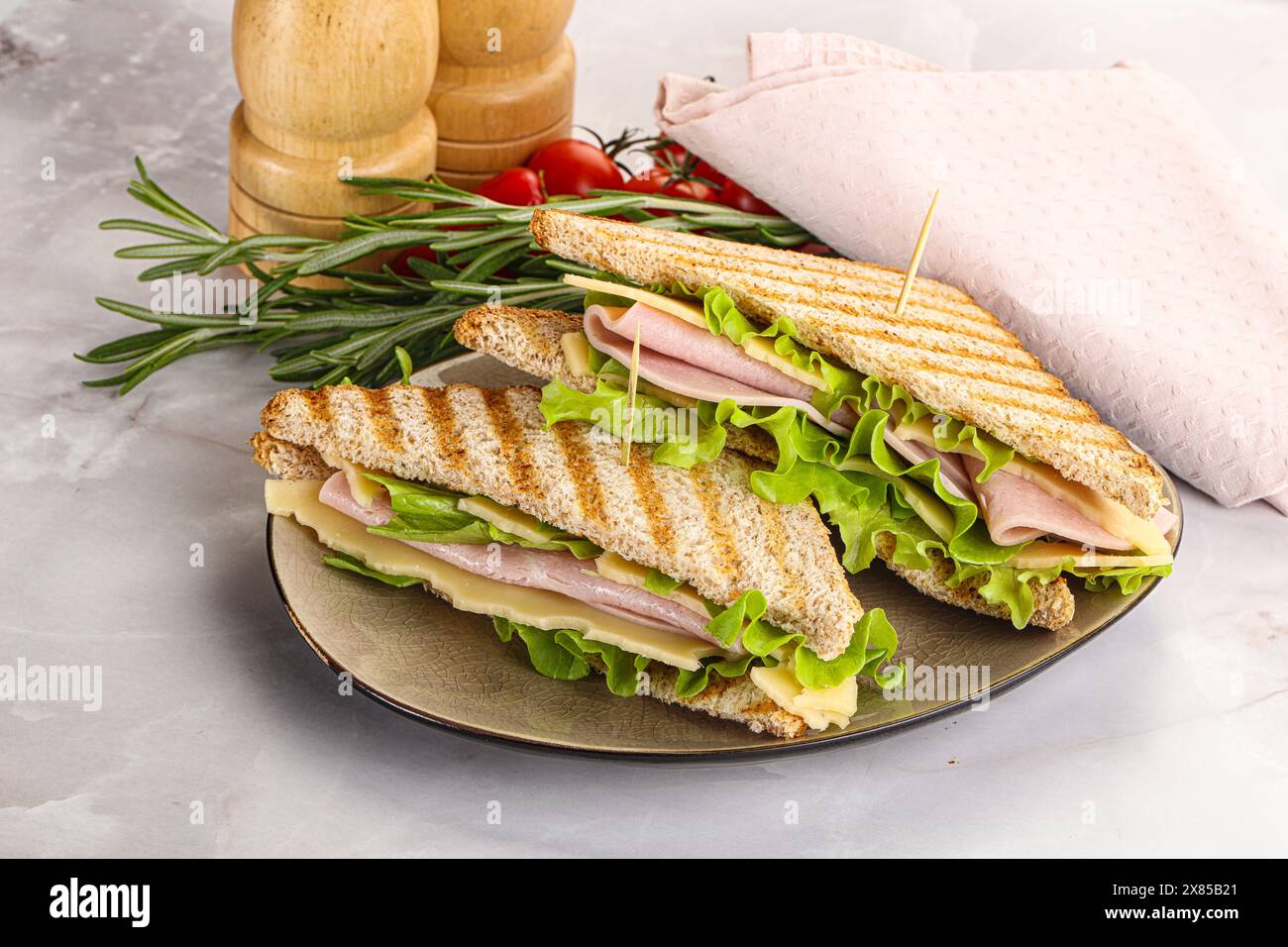 Homemade club sandwich with ham, salad and cheese Stock Photo - Alamy