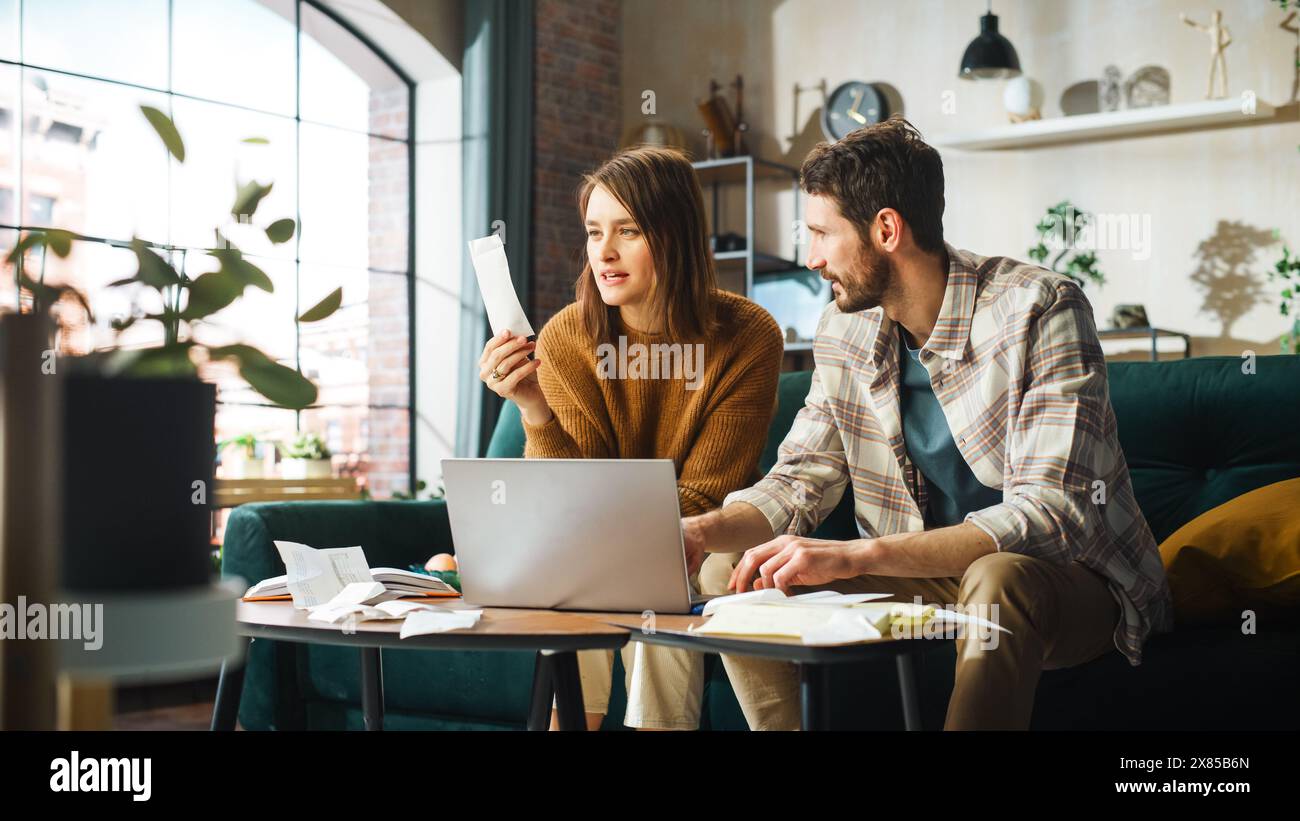 Doing Accounting at Home: Happy Couple Using Laptop Computer, Sitting ...
