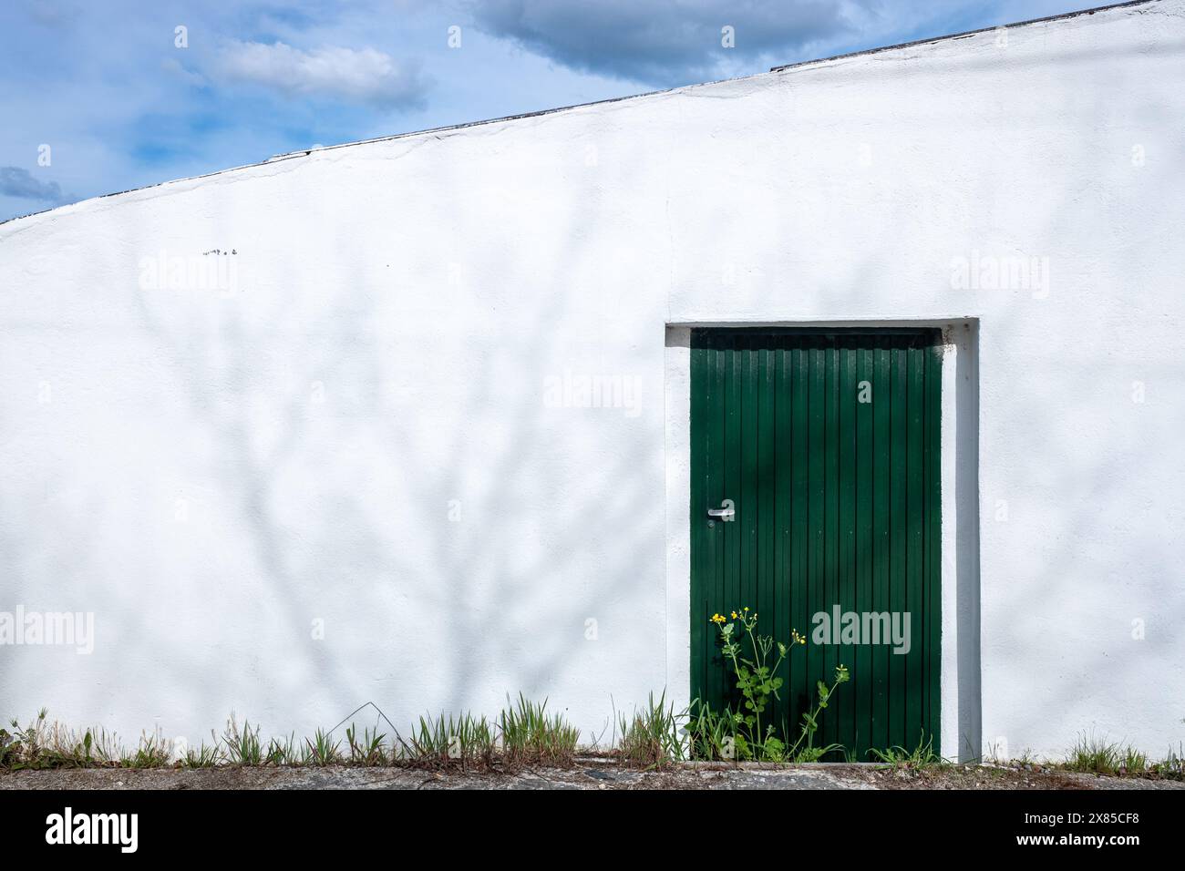 facade of a small rural warehouse, to store tools and implements Stock ...