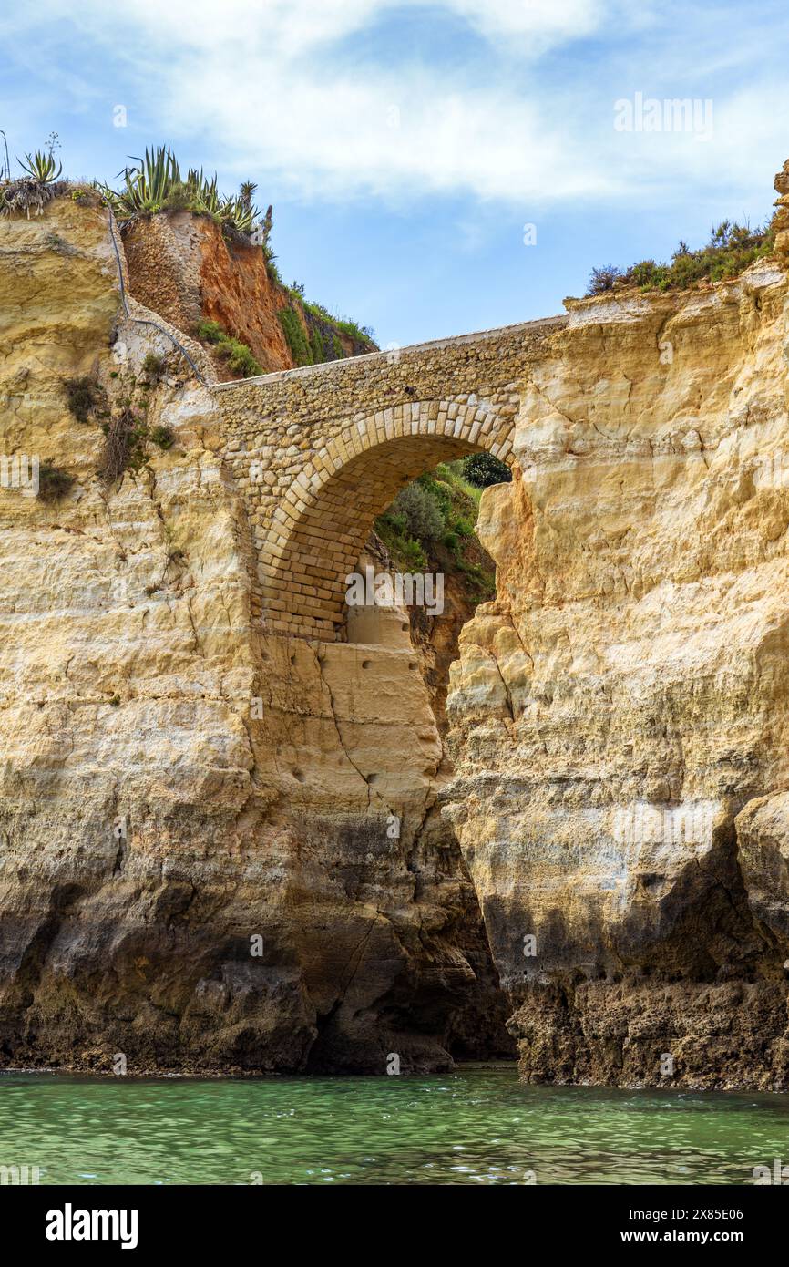 Pinhao Fort Bridge, an ancient stone bridge at Praia dos Estudantes ...