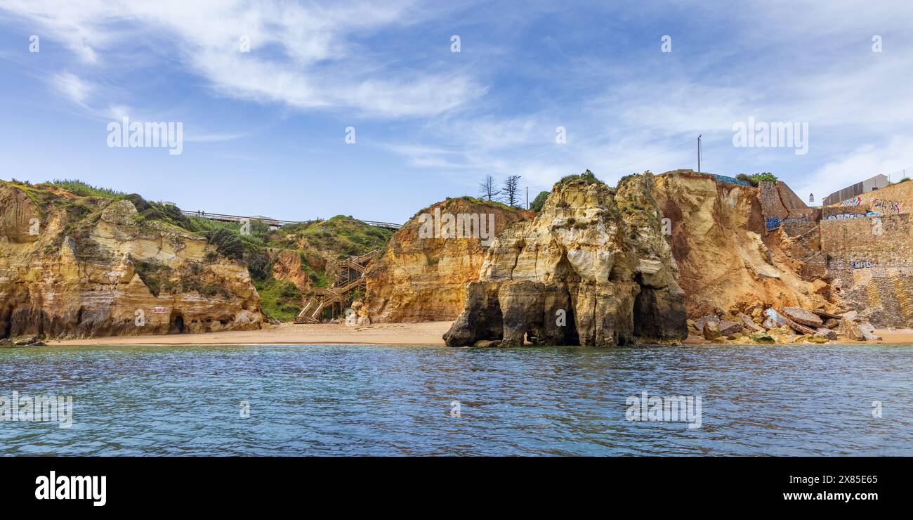 View from the sea of cliff coastal erosion at Praia do Pinhao beach ...