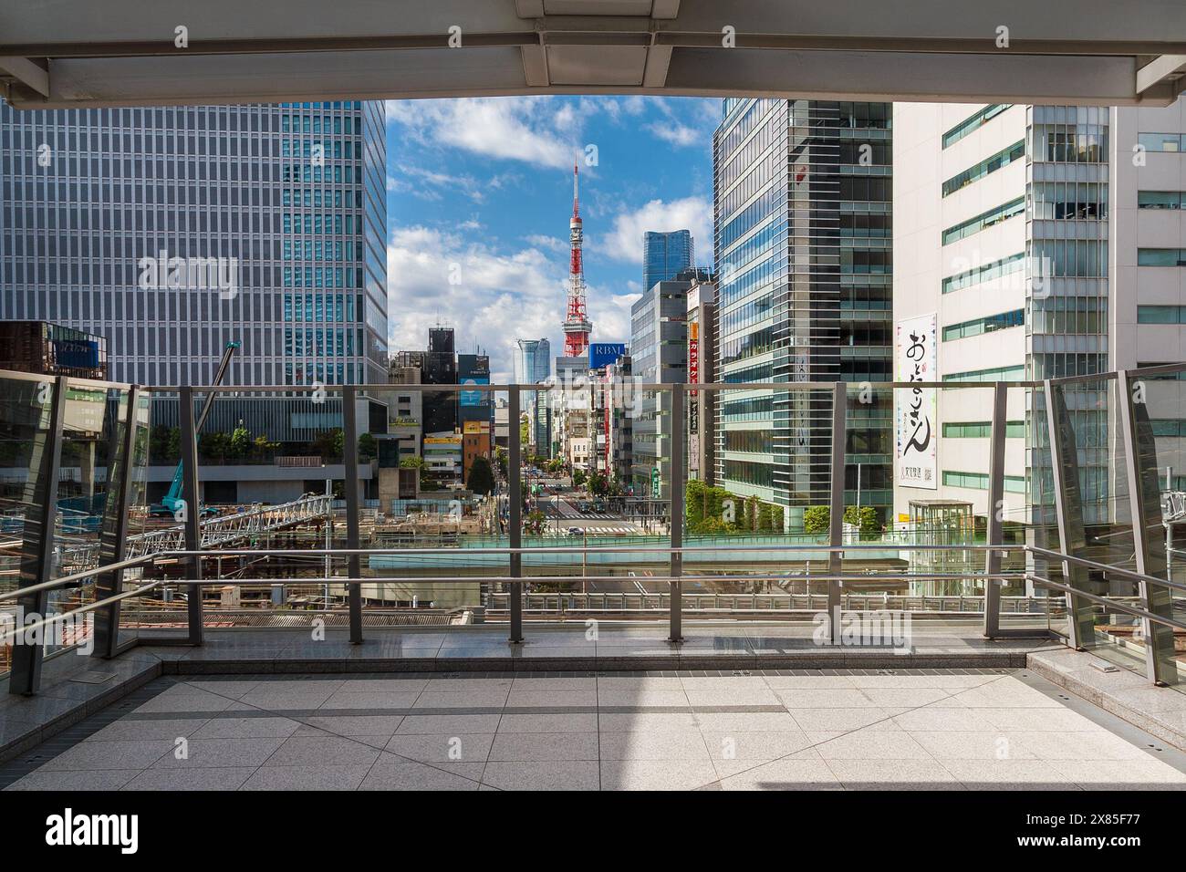 Tokyo modern landmarks. Roppongi Hills, Azabudai Hills skyscrapers and the famous Tokyo Tower in ...