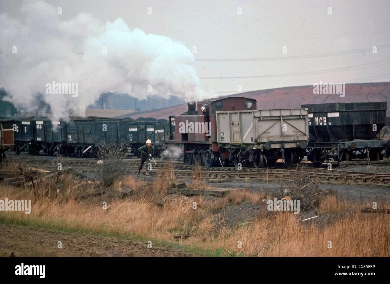 UK Coal mining in the 1960's, Steam train shunting wagons at Newmarket ...