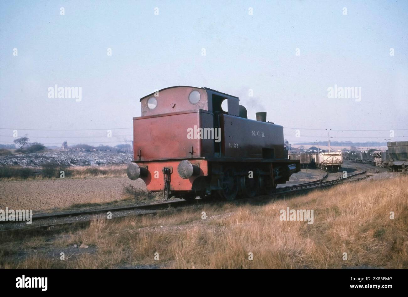 UK Coal mining in the 1960's, Steam train shunting wagons at Newmarket ...