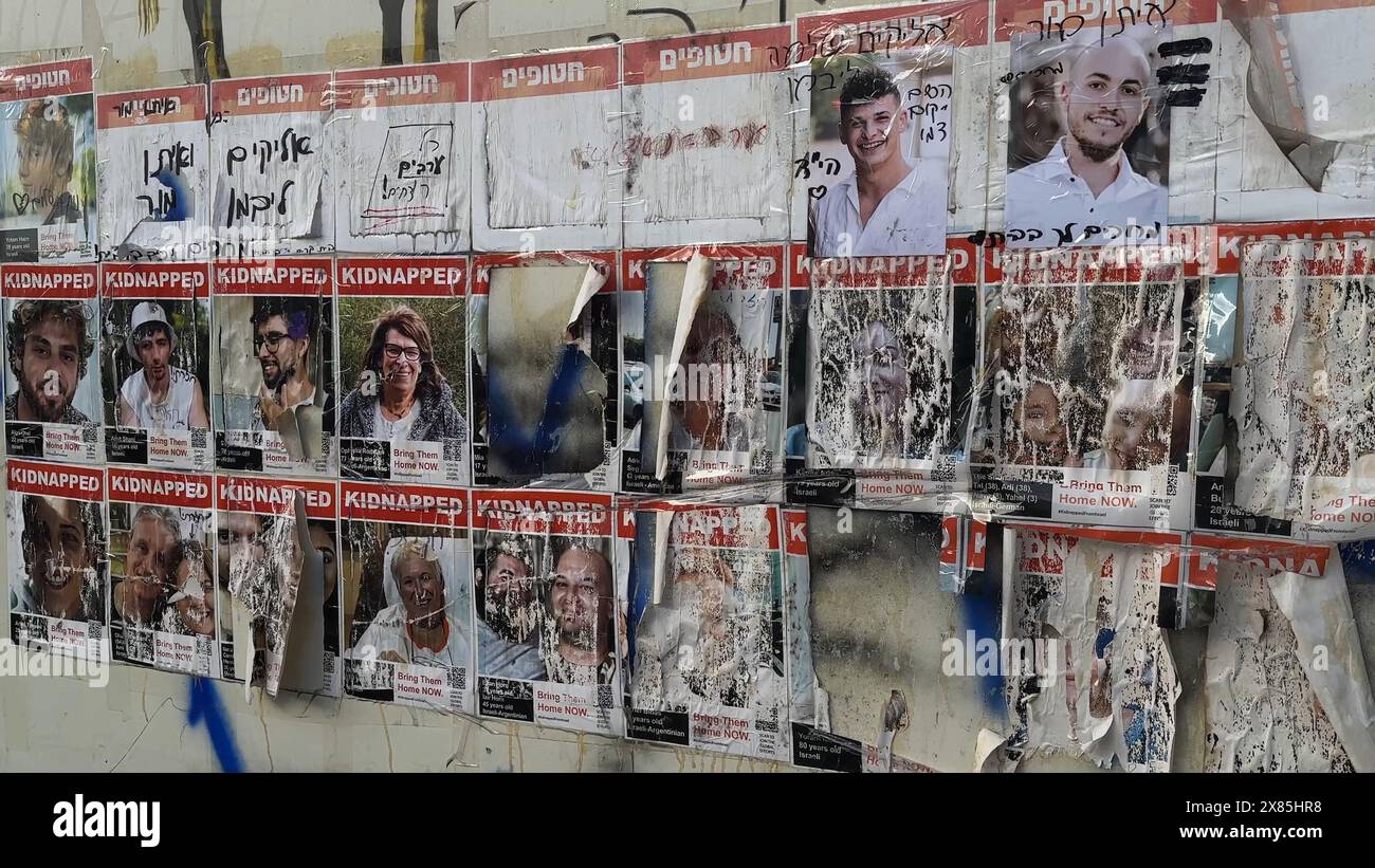 Posters with images of Israeli hostages held in Gaza that were recently ...