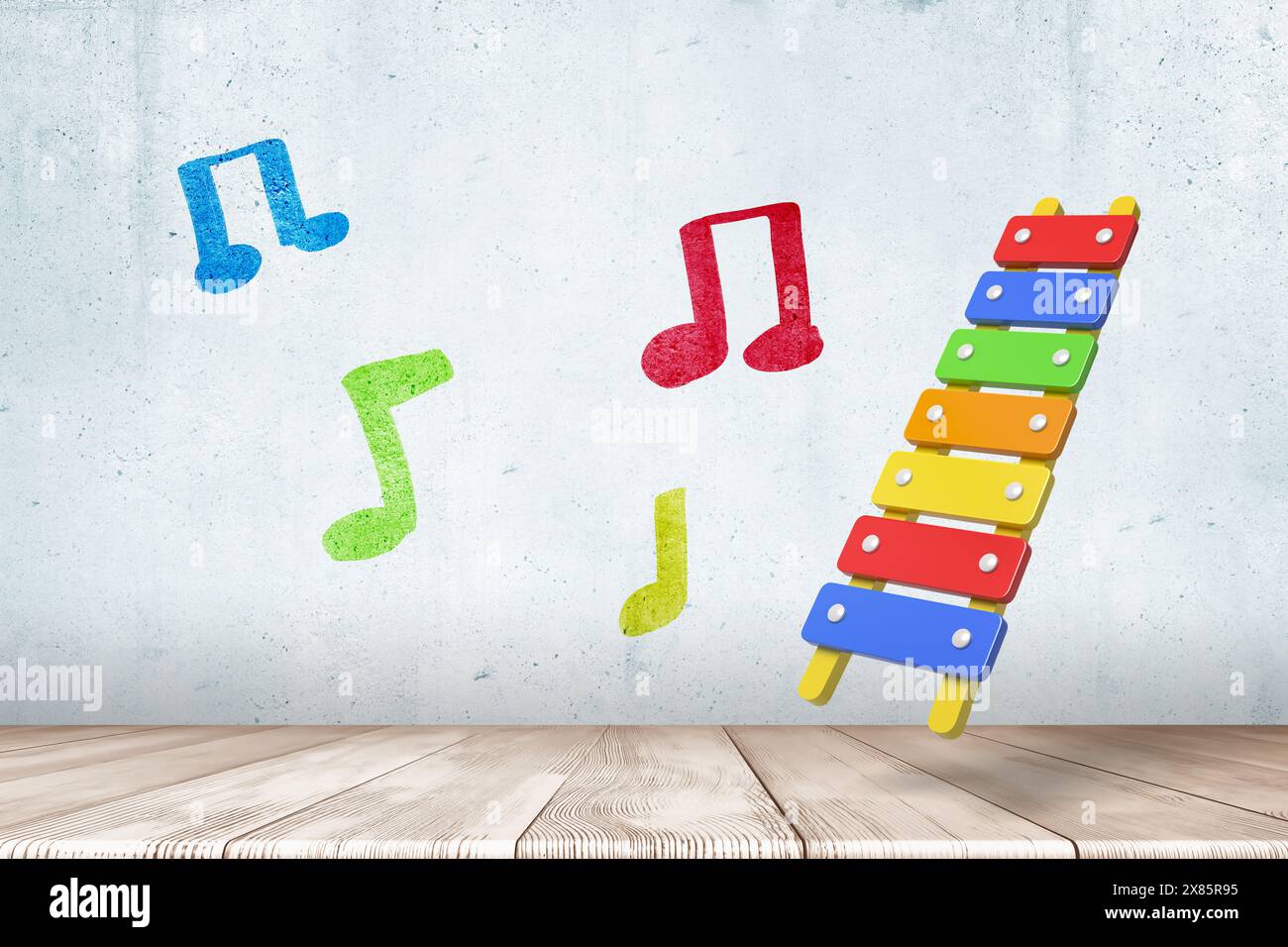 Xylophone with floating musical notes on wall Stock Photo - Alamy