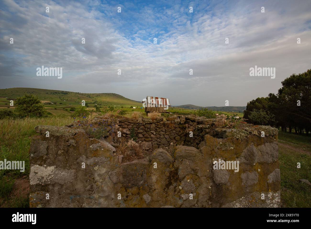 Very old wind mill from 19th century and a disused well in the ...
